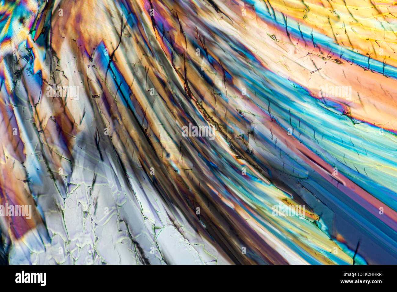 colorful microscopic shot of sugar micro crystals in polarized light ...