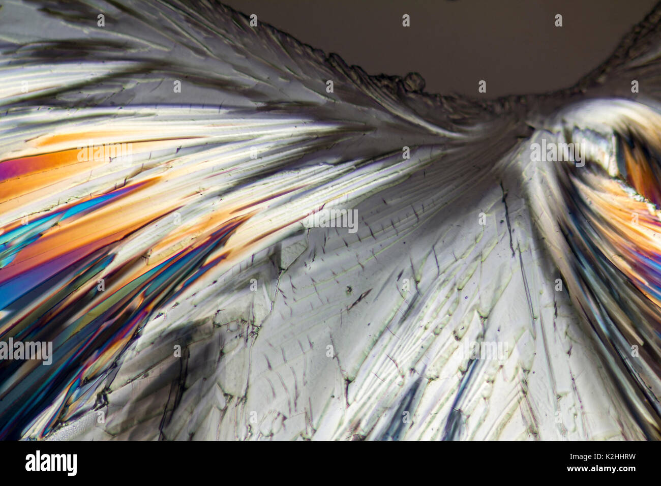 colorful microscopic shot of sugar micro crystals in polarized light ...