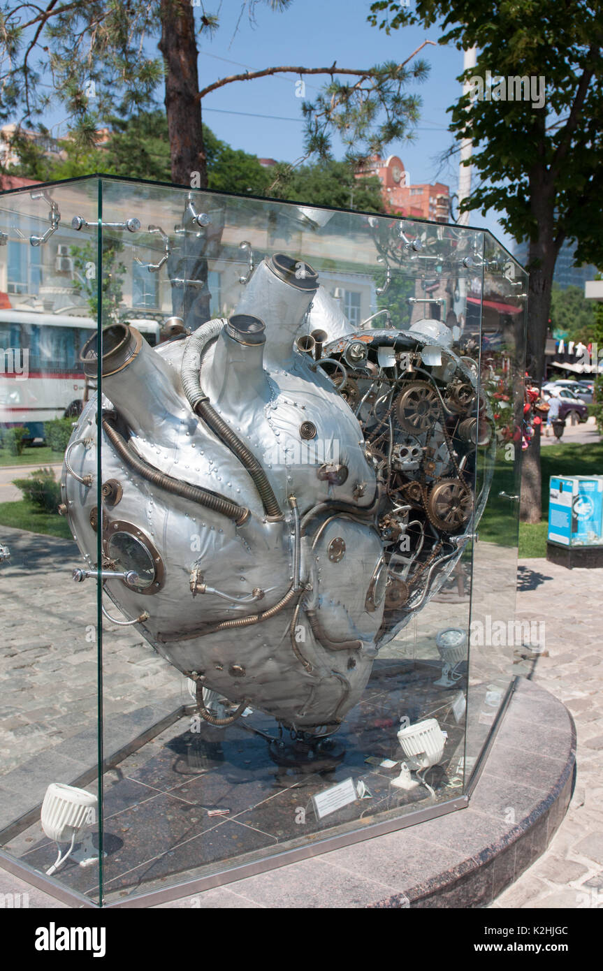 Iron mechanical heart. Sculpture street art Stock Photo - Alamy