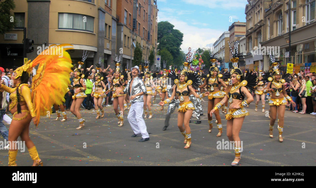 London, Notting Hill carnival. Parade of dancers in costume Stock Photo ...