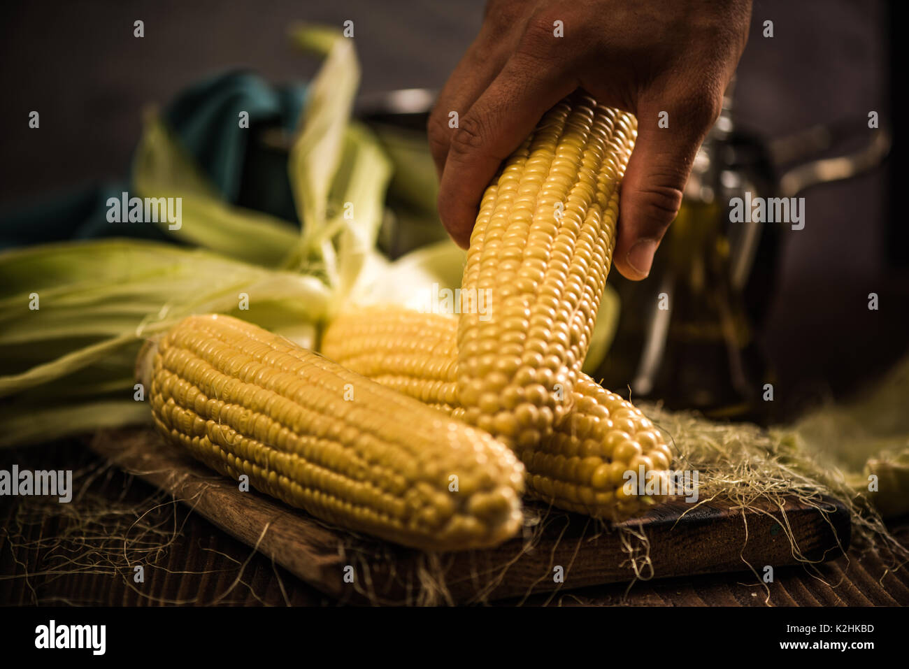 Grilled corn hand hi-res stock photography and images - Alamy