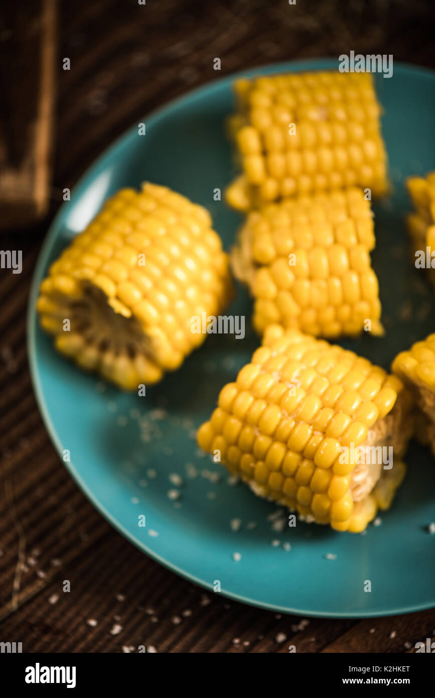 Cooked corn on the cob with salt and butter Stock Photo - Alamy