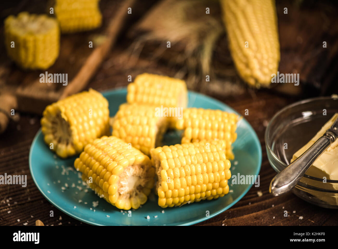 Cooked corn on the cob with salt and butter Stock Photo - Alamy