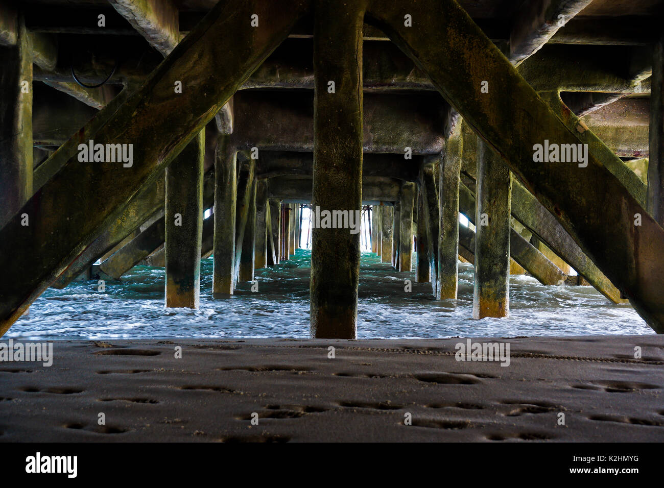 A view under a pier in the UK Stock Photo - Alamy