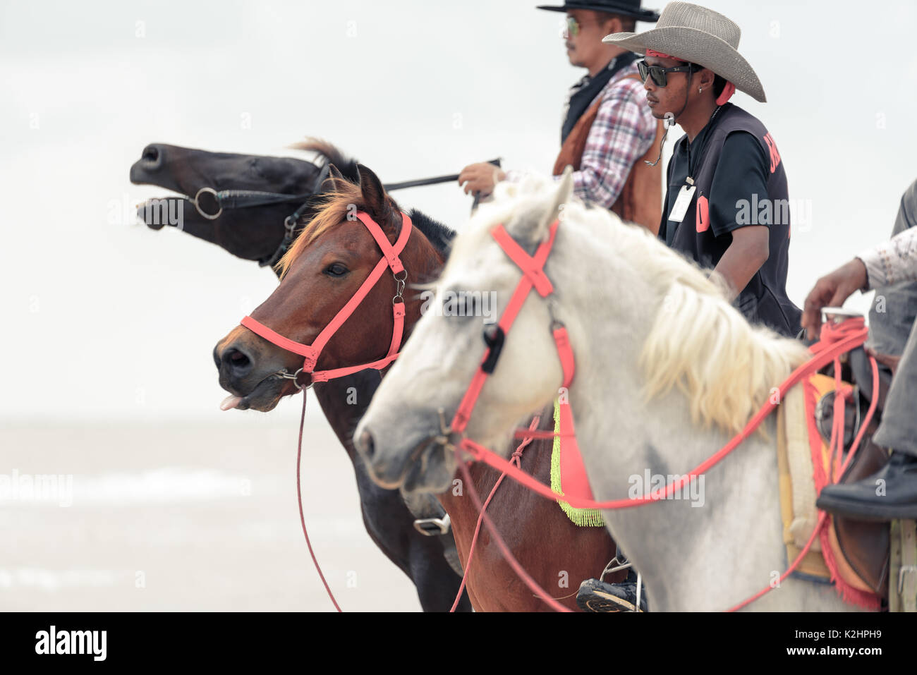 SONGKHLA THAILAND - FEBRUARY 18: Unknow three cowboys show on the beach ...
