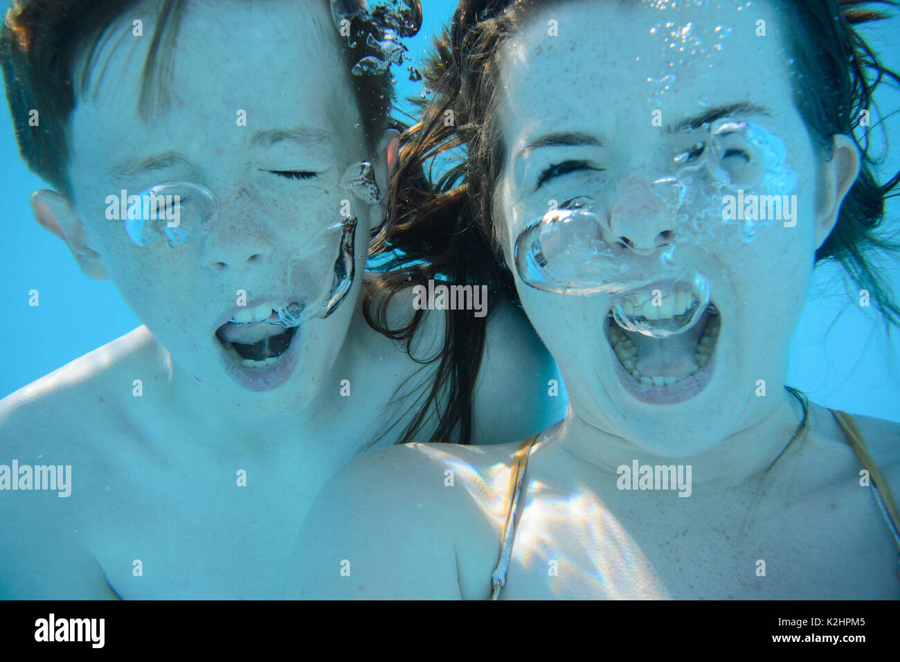 Teenager Boy Swimming Underwater In High Resolution Stock Photography ...