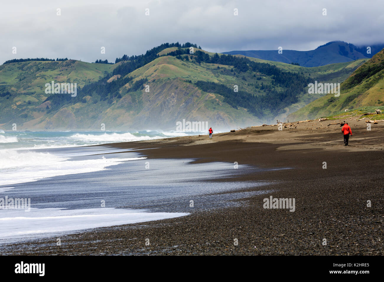 Lost Coast hills crowned in shadow present backdrop for ocean and beach ...