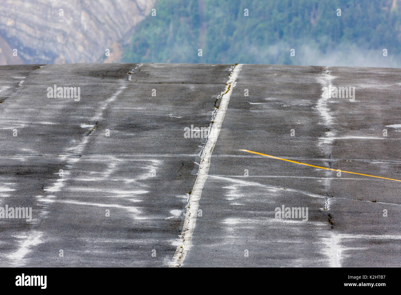 Airfield in the French Alps, the runway at L’Alpe d’Huez has steep ...