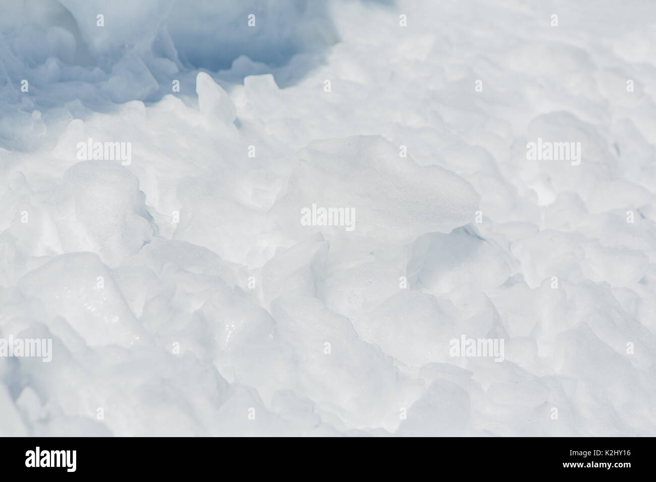 Melting snow white background in the mountains Stock Photo - Alamy