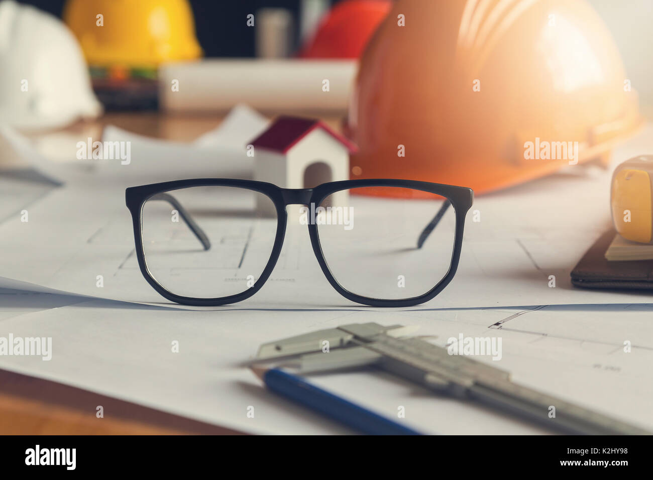 Engineer and Architect concept, Close up eyeglasses with blueprints and ...