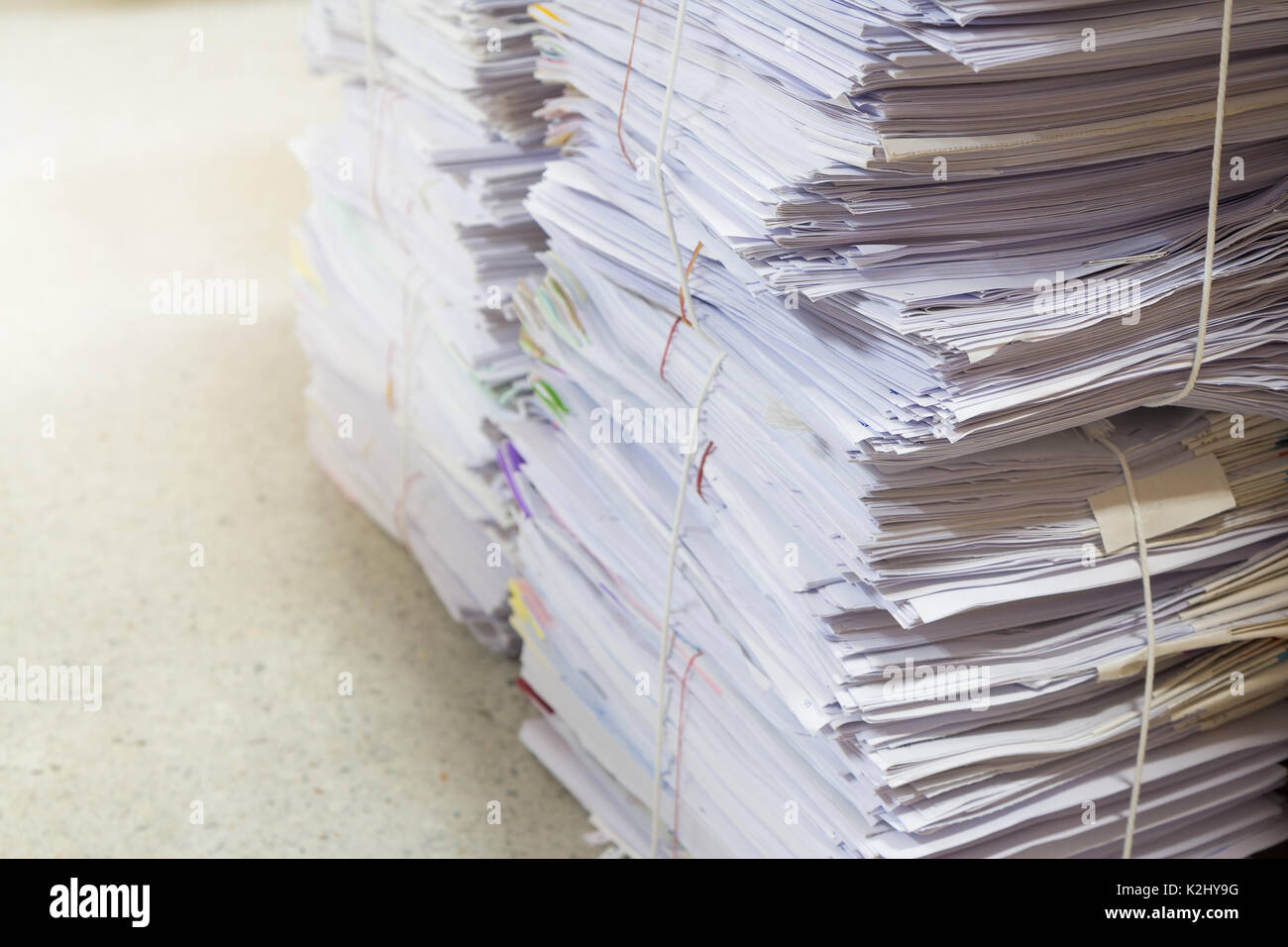 Stack of business paper, office workload paperwork Stock Photo - Alamy