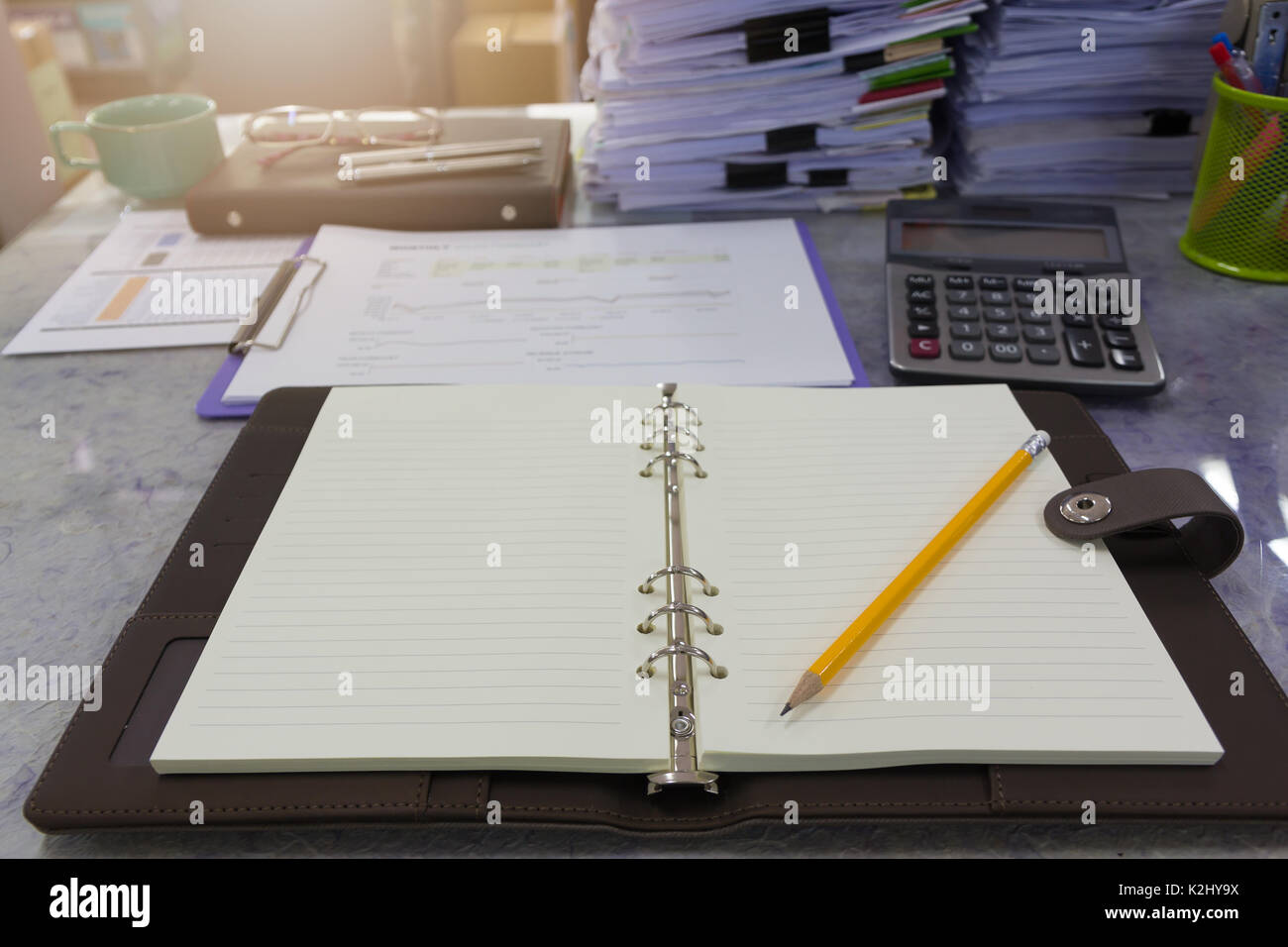 Business and finance concept of office working, Opened blank notebook ...