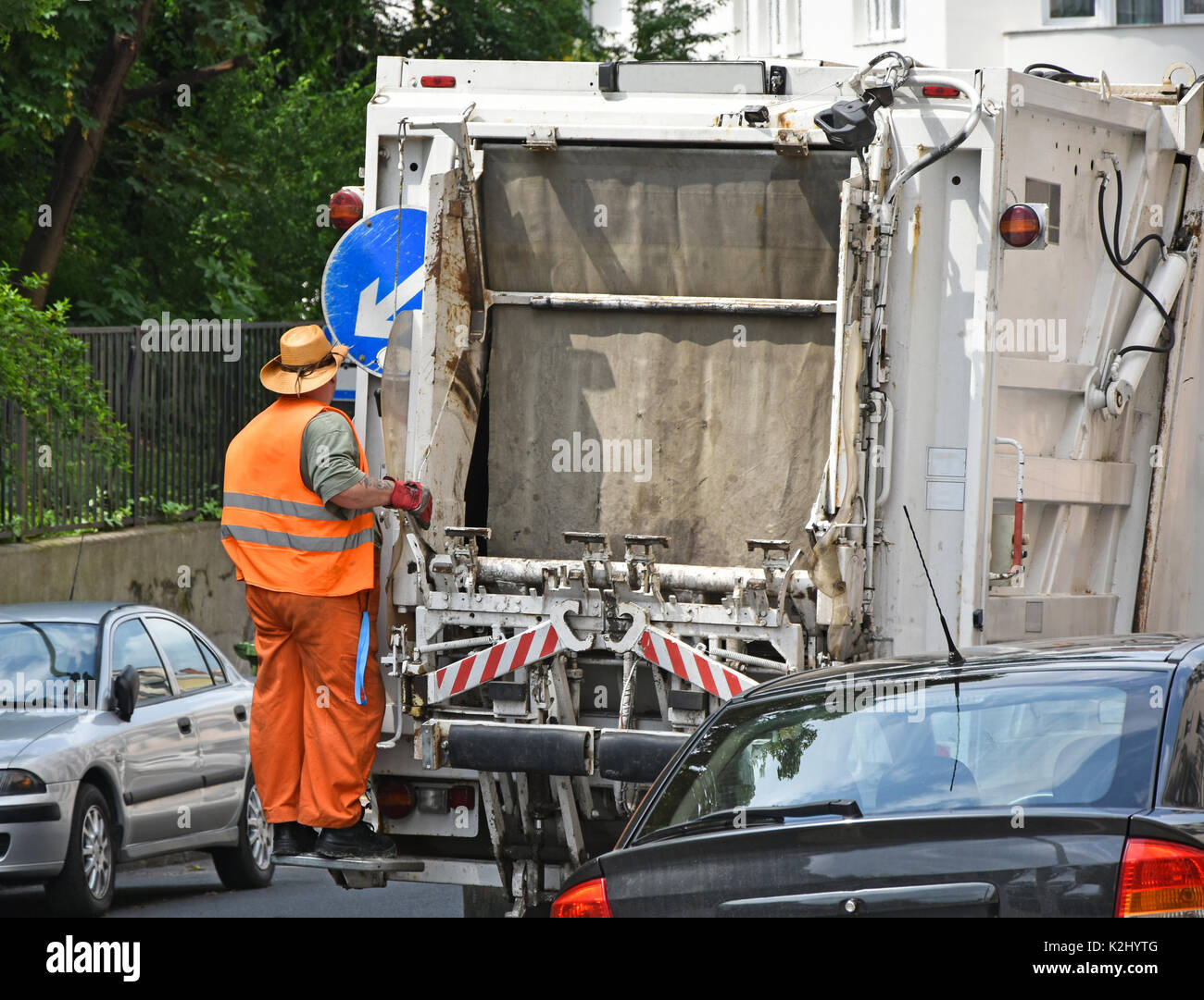 Garbage truck on the street Stock Photo - Alamy