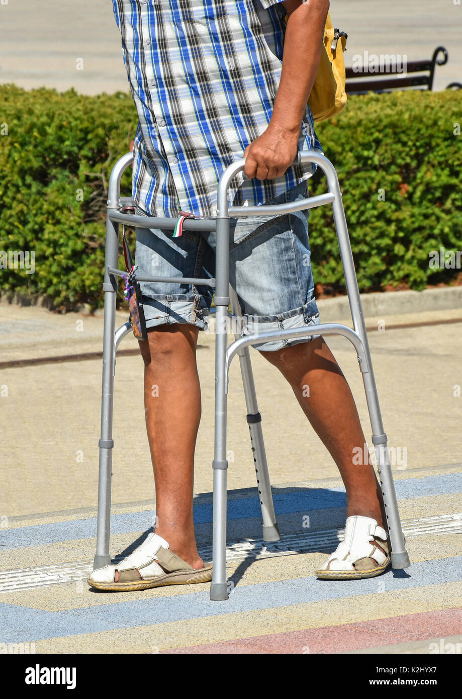 Old man sitting on walker hi-res stock photography and images - Alamy