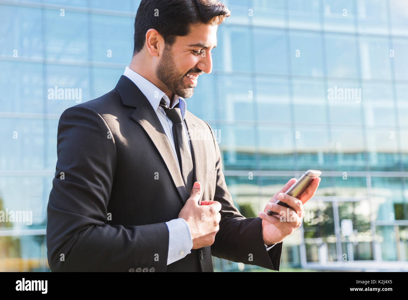 Arabic serious smiling happy successful positive businessman or worker ...