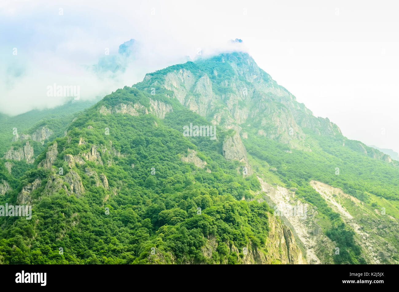 Beautiful view of green Ossetian mountain peak Stock Photo - Alamy