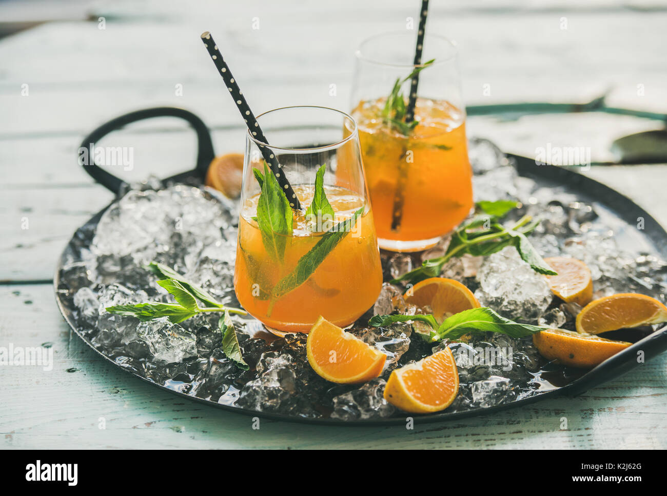 Refreshing cold alcoholic summer citrus cocktail with orange ...