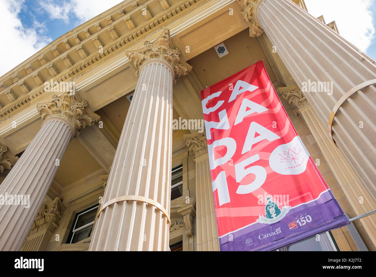 Alberta Legislature Building with columns and Canada 150 Banner ...