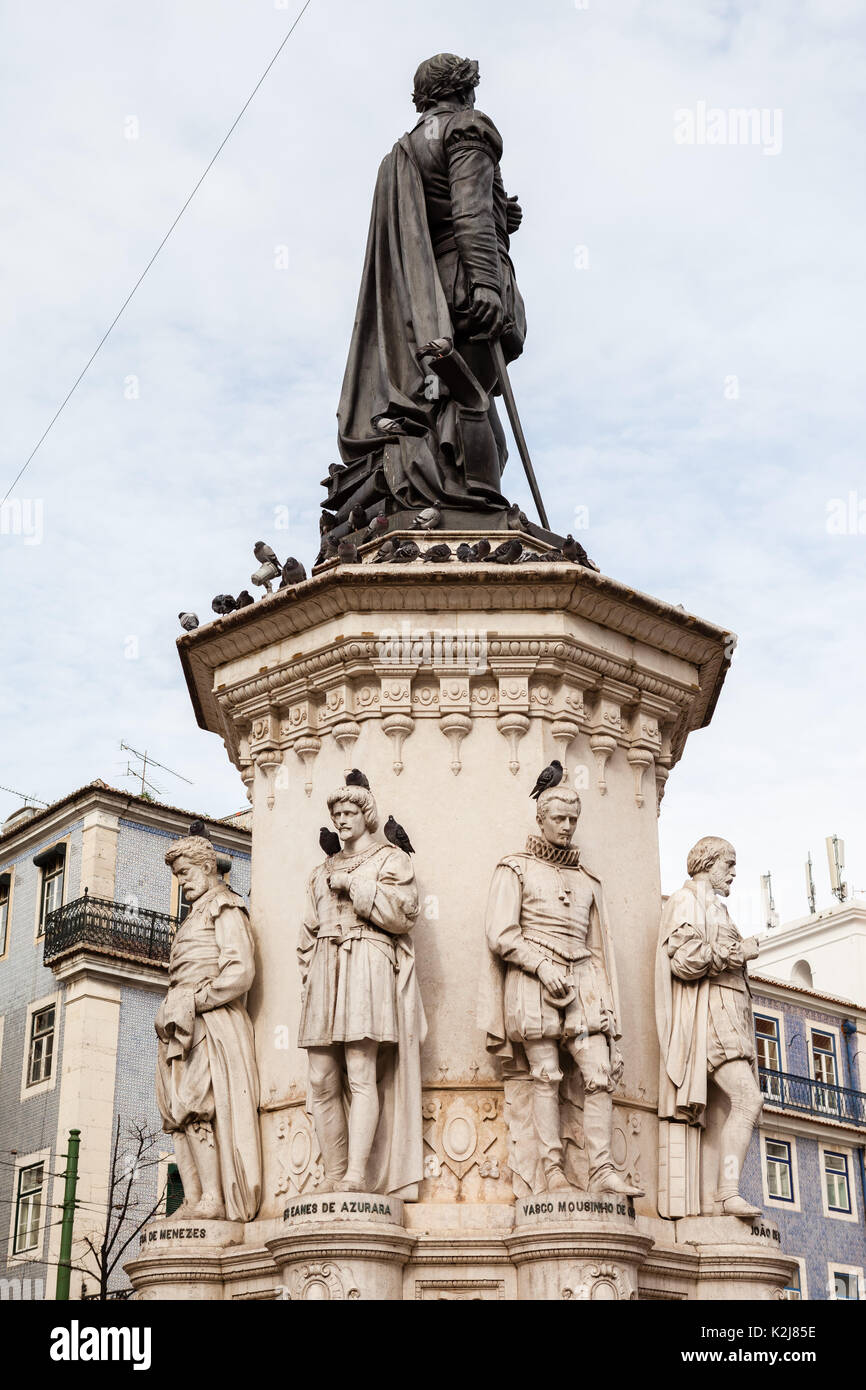 Iron statue over stone support Stock Photo - Alamy