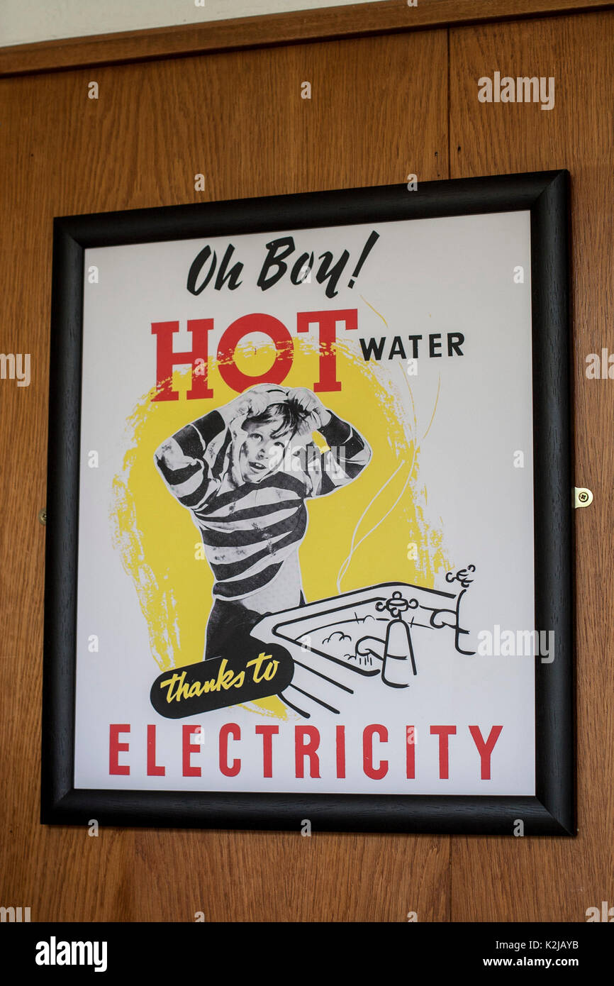 Old fashioned advertisement signs for electricity in Ireland in the ...