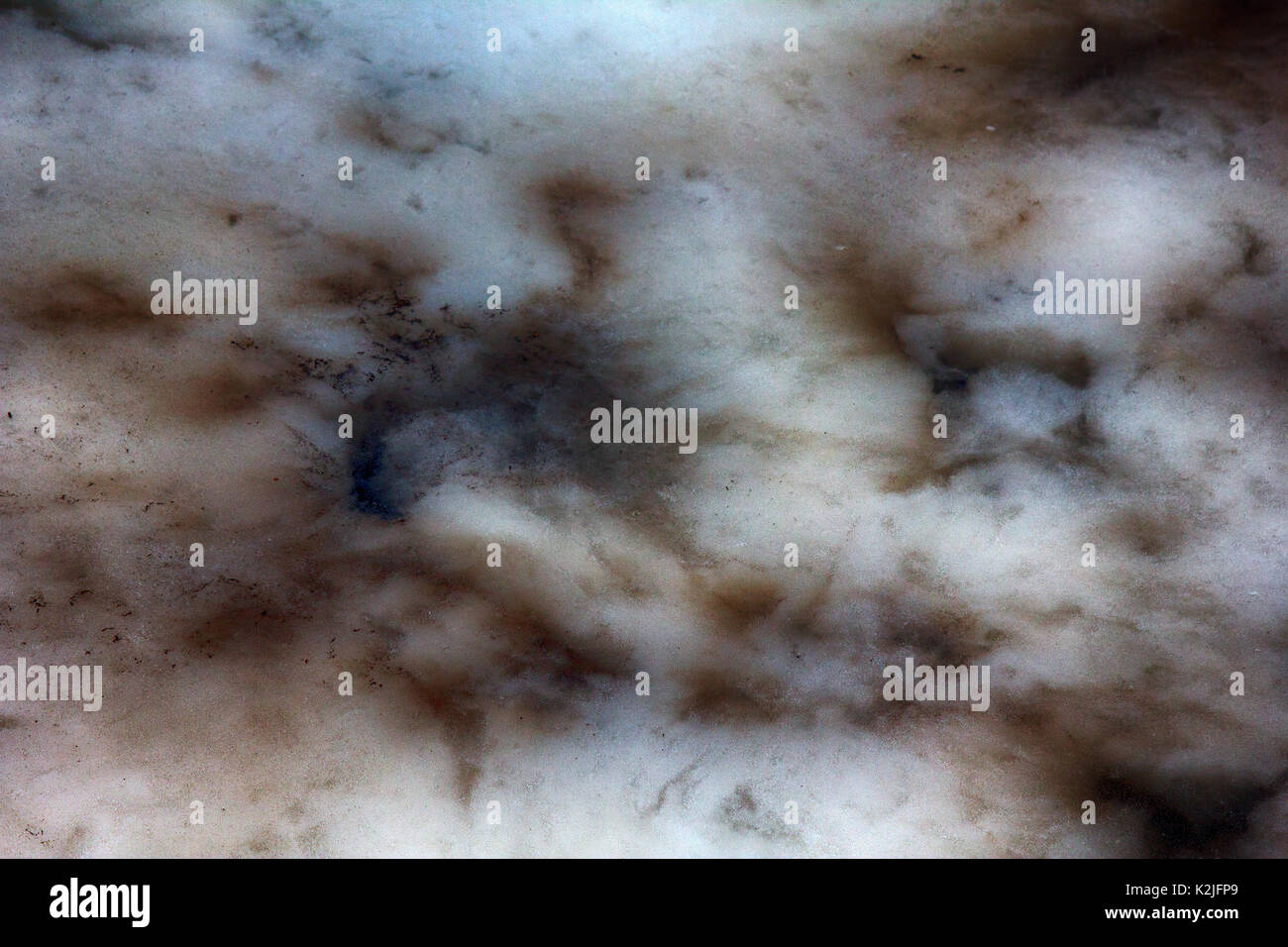 background ice beautiful after a heavy frost. frozen in ice snow in a ...