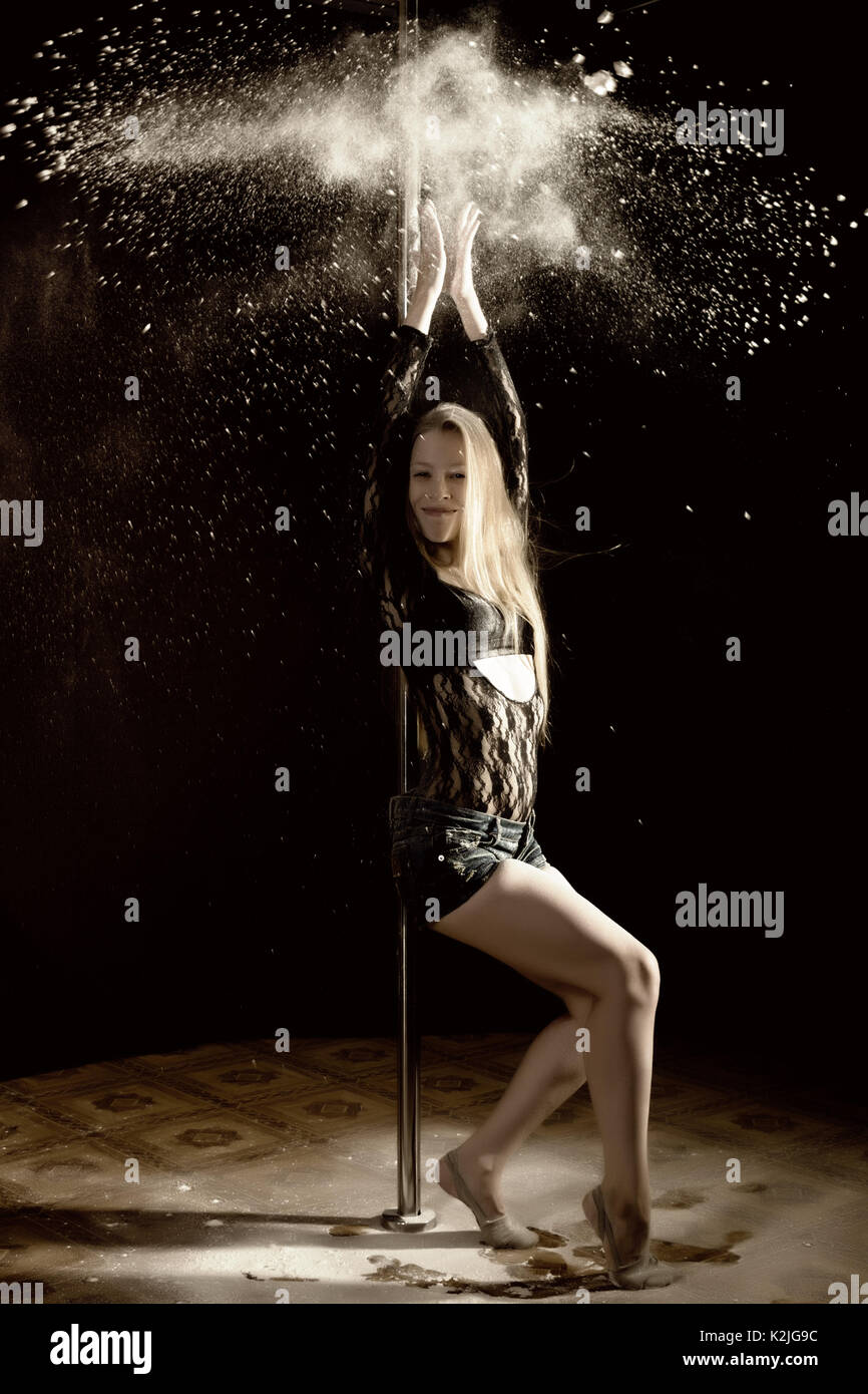 Beautiful expressive dencer dancing at studio with flour Stock Photo ...