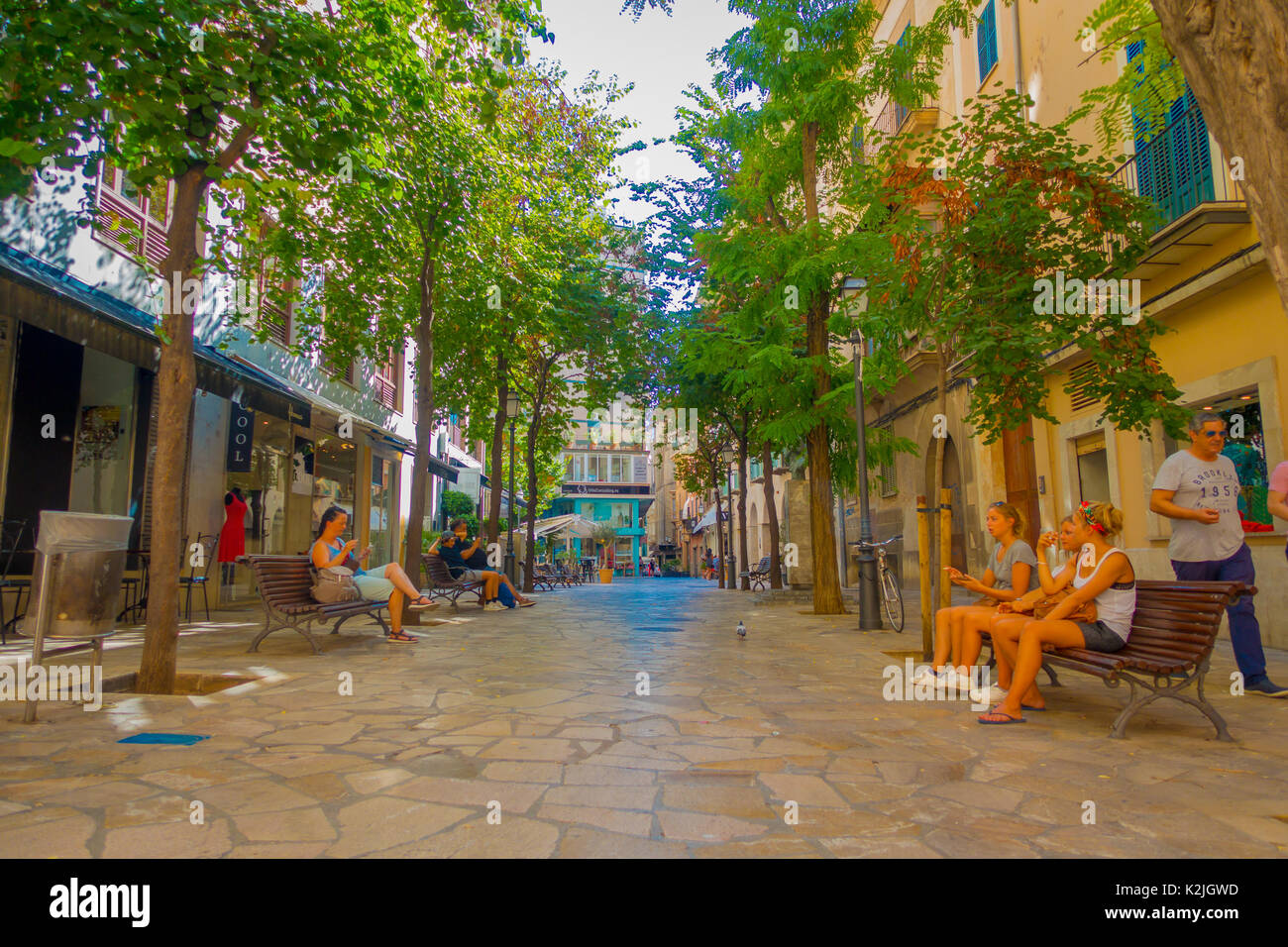 PALMA DE MALLORCA, SPAIN - AUGUST 18 2017: Unidentified people sitting ...