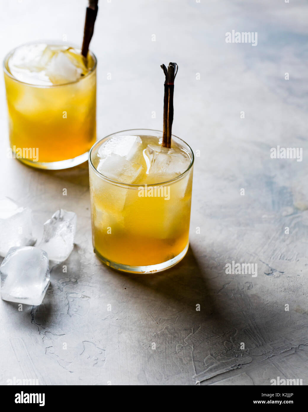 Golden whiskey cocktails Stock Photo - Alamy