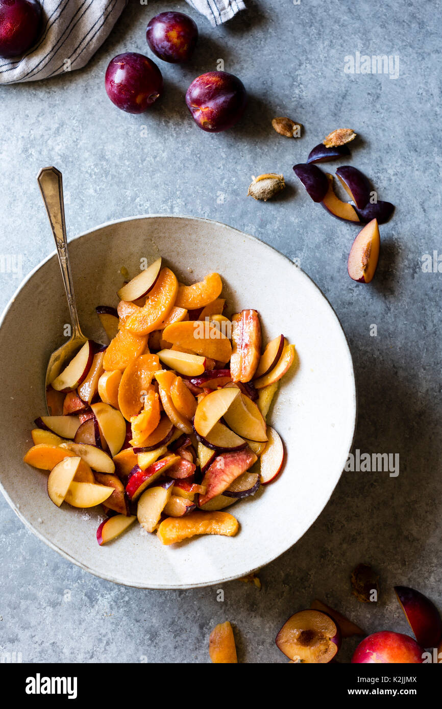 Peaches, Plums and nectarines being chopped for a dessert Stock Photo ...