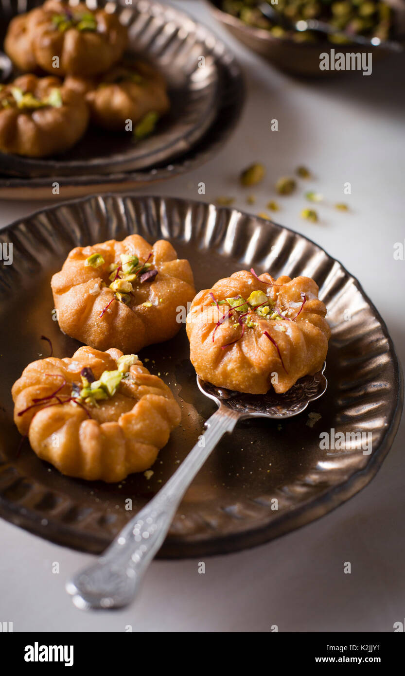 Badhusha / Balushahi in a ceramic plate on top view Stock Photo - Alamy