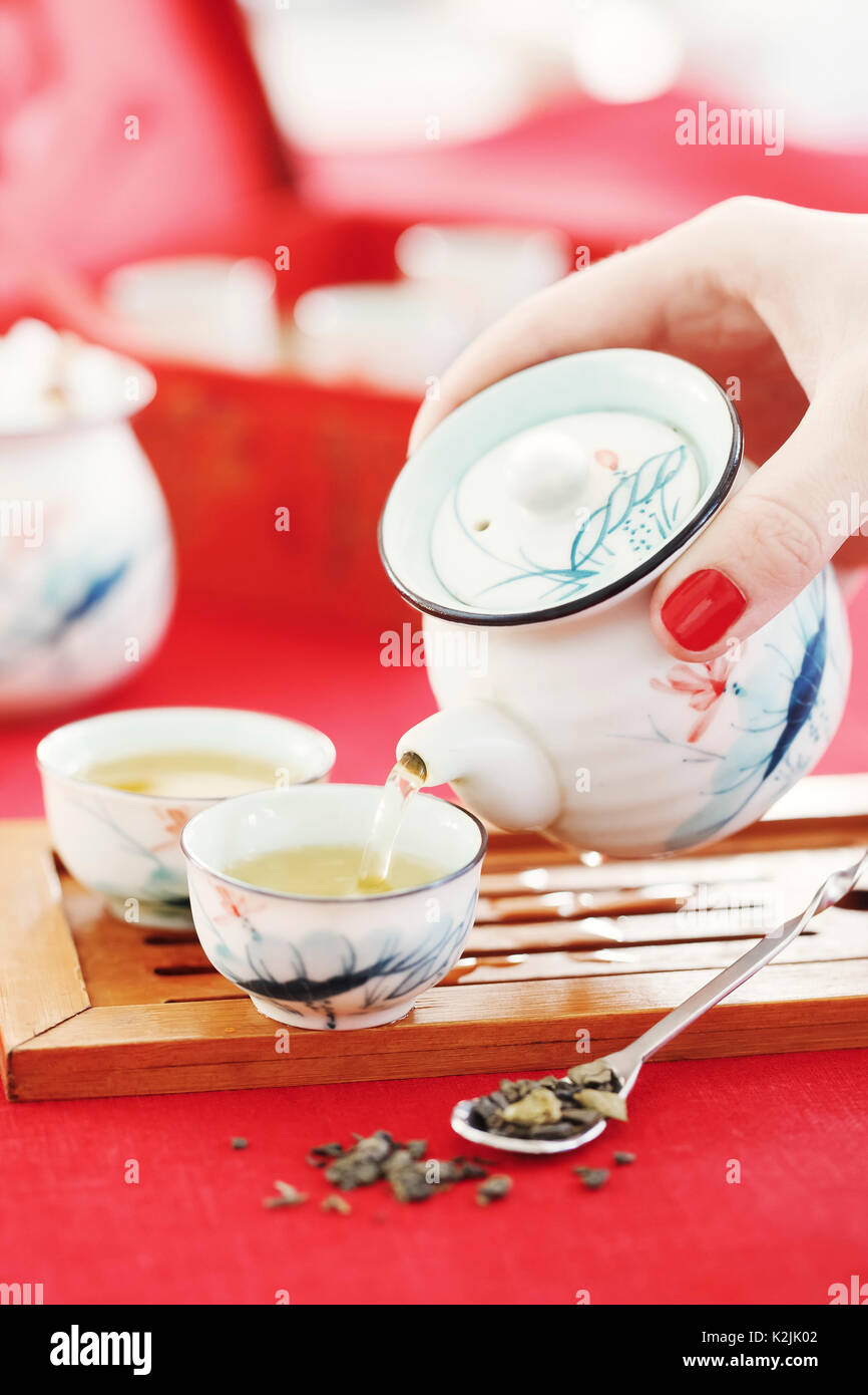 Green tea in a porcelain service Stock Photo - Alamy