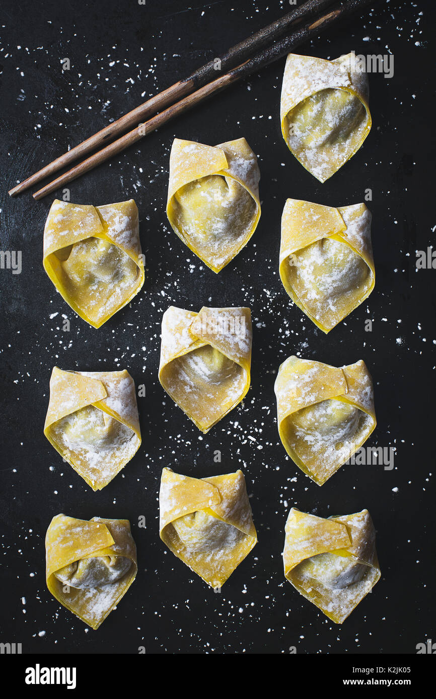Chinese wontons on dark background Stock Photo - Alamy