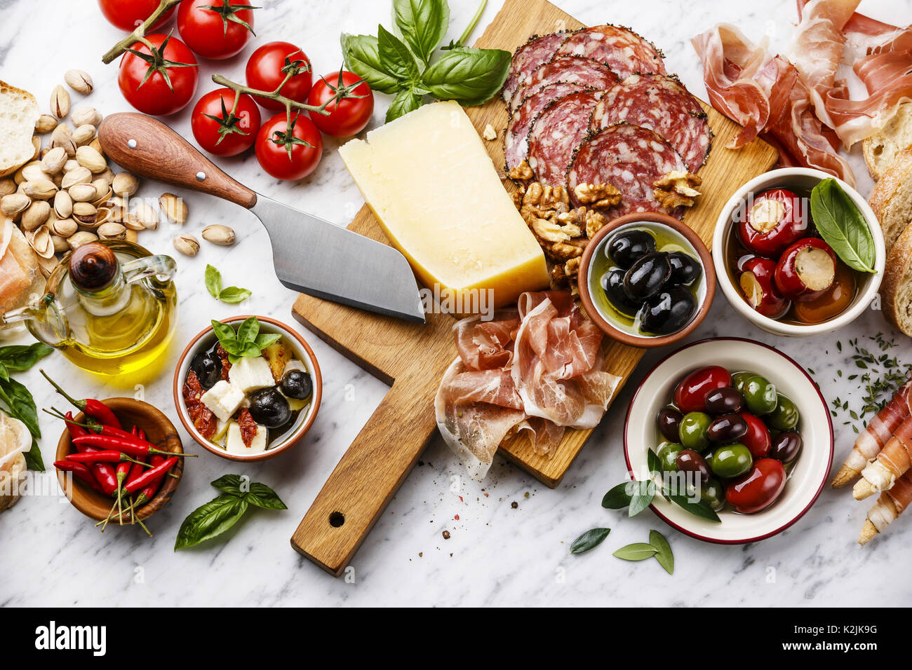 Italian snacks food with Ham, Sliced bread Ciabatta, Olives, Parmesan ...