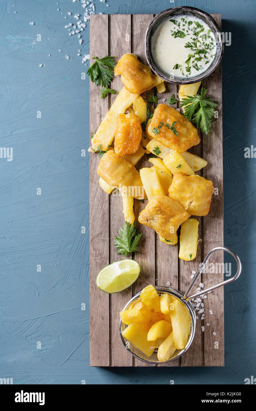 Traditional british fast food fish and chips. Served with white cheese ...