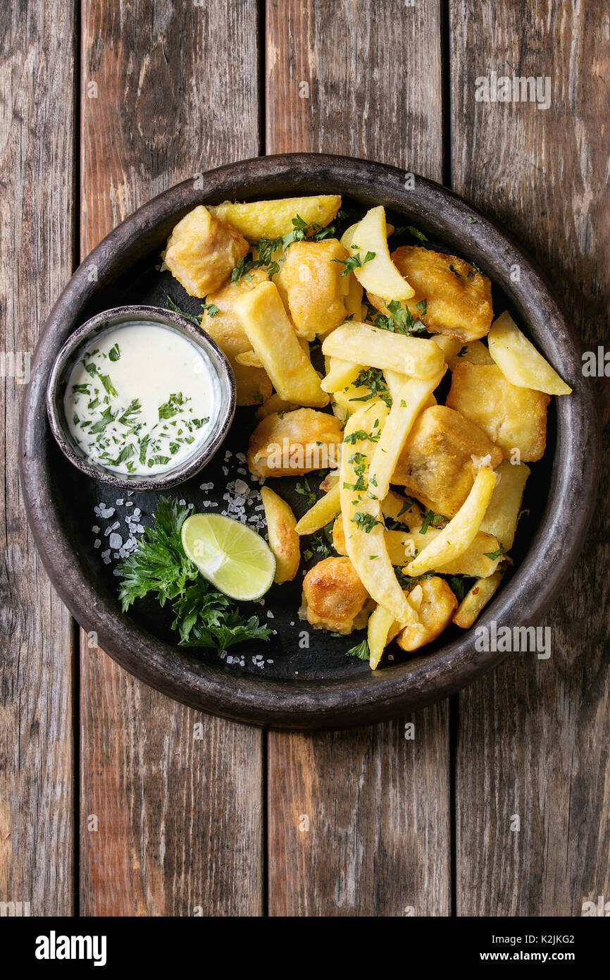 Traditional british fast food fish and chips. Served with white cheese ...