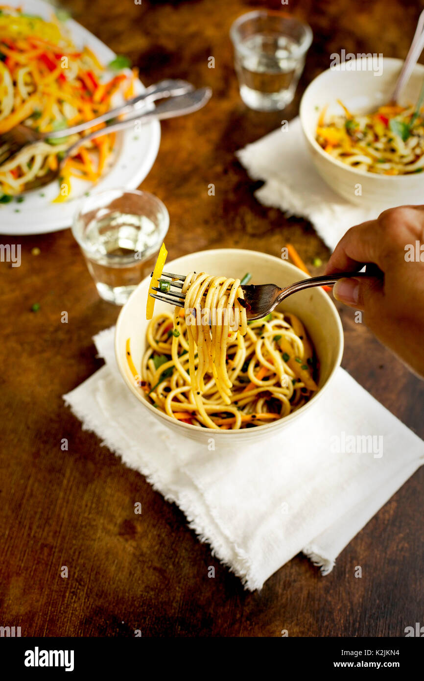 Woman eating pasta black and white hi-res stock photography and images ...
