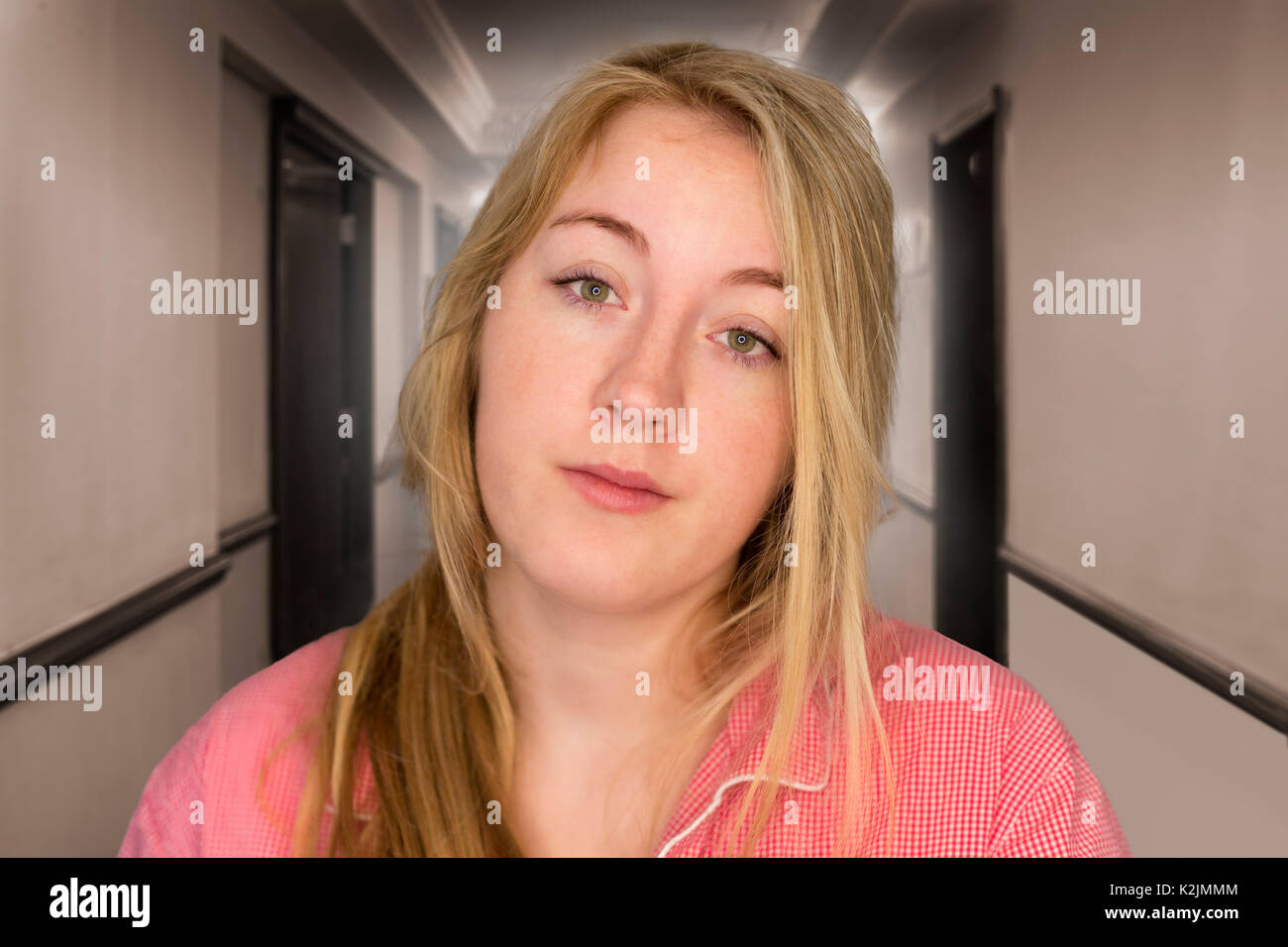 attractive female looking sleepy in pyjamas looking very natural no ...