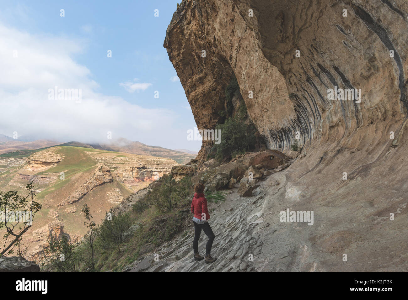 Tourist trekking on marked trail in the Golden Gate Highlands National ...