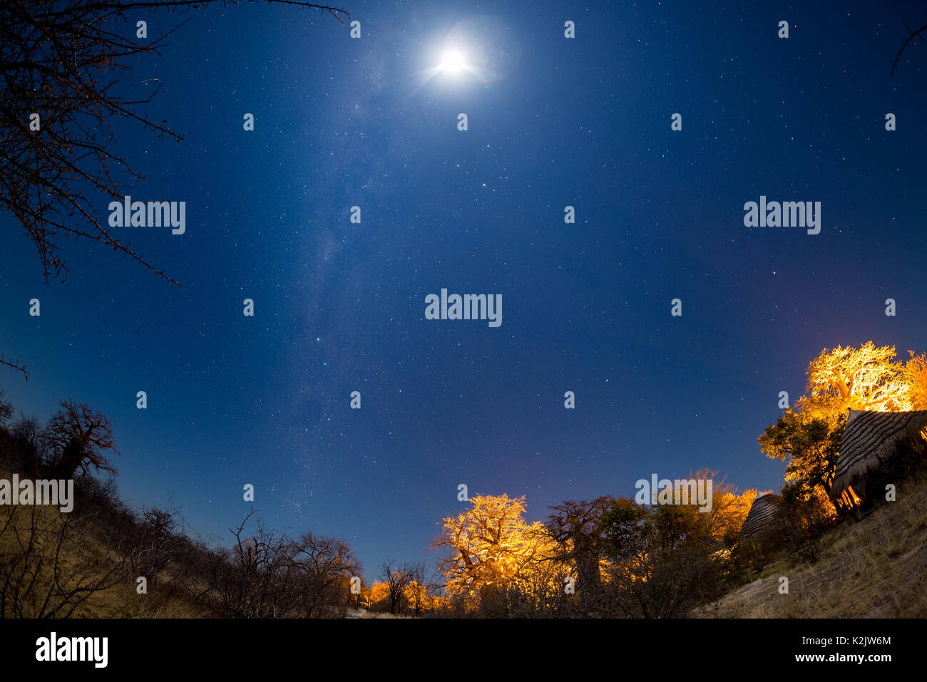 Starry sky, Milky Way arc and moon, captured from the Kalahari Desert ...