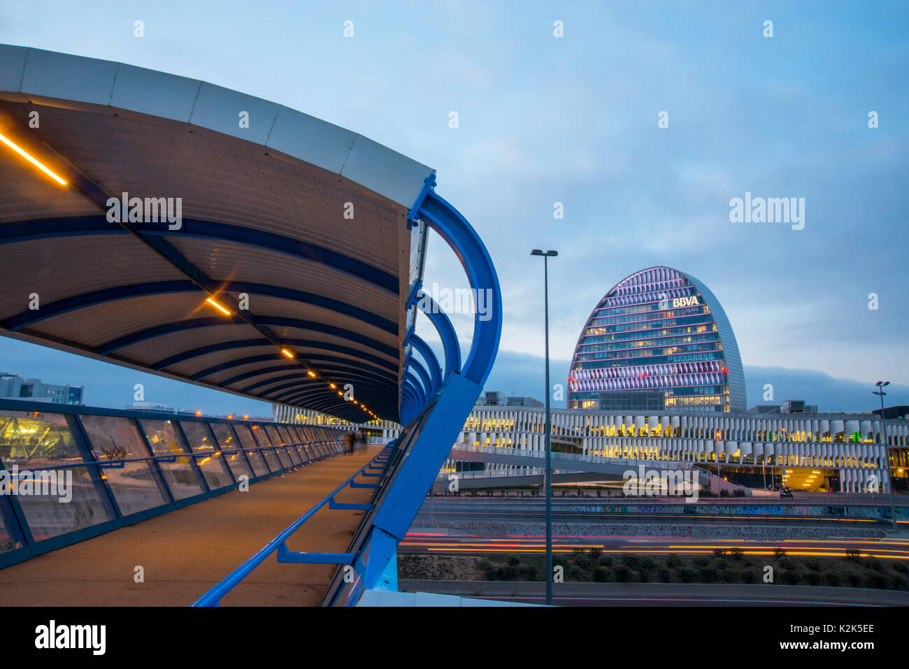 Footbridge over A1 highway and La Vela building, night view ...