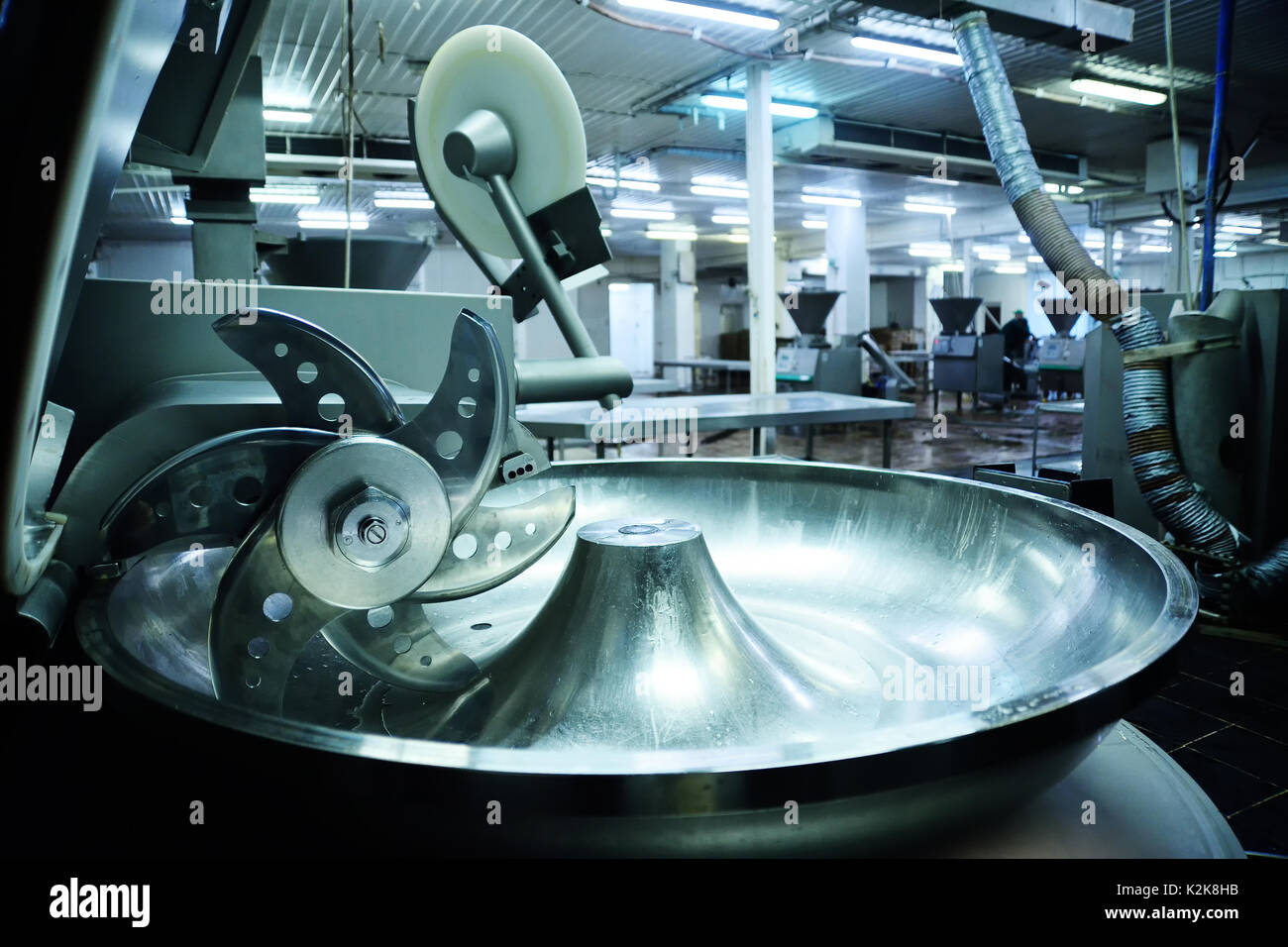 cutter for meat at meat factory Stock Photo - Alamy