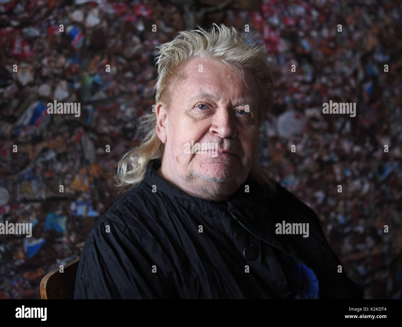 Cologne, Germany. 31st Aug, 2017. Performance artist HA Schult stands ...