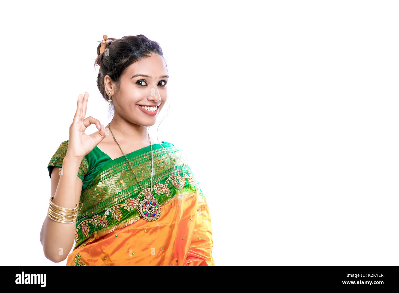 Happy young beautiful traditional Indian woman in traditional saree ...