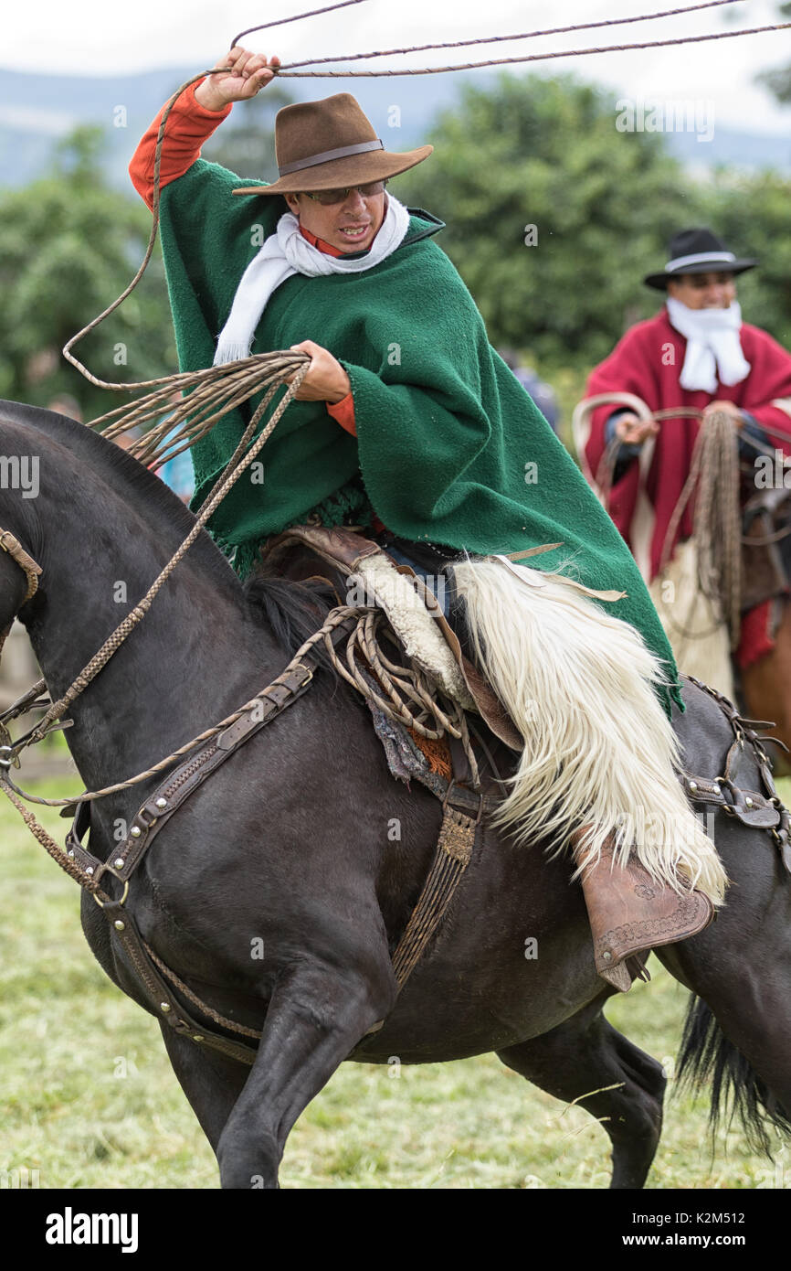 Cowboy in poncho hi-res stock photography and images - Alamy