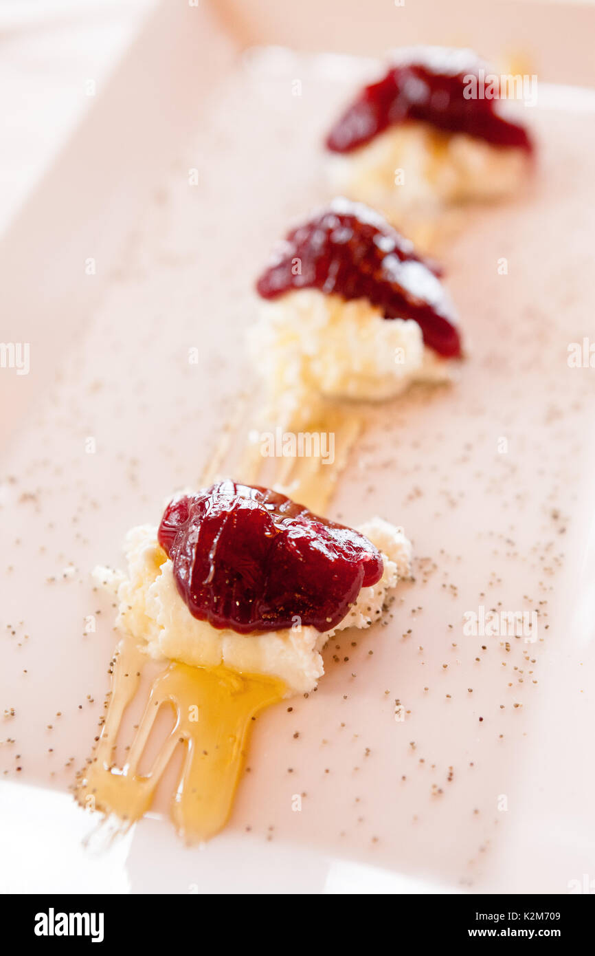 Cheese with honey and strawberry ham Stock Photo - Alamy