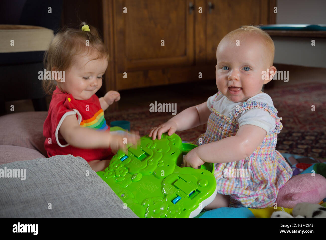 10 month old babies playing Stock Photo - Alamy