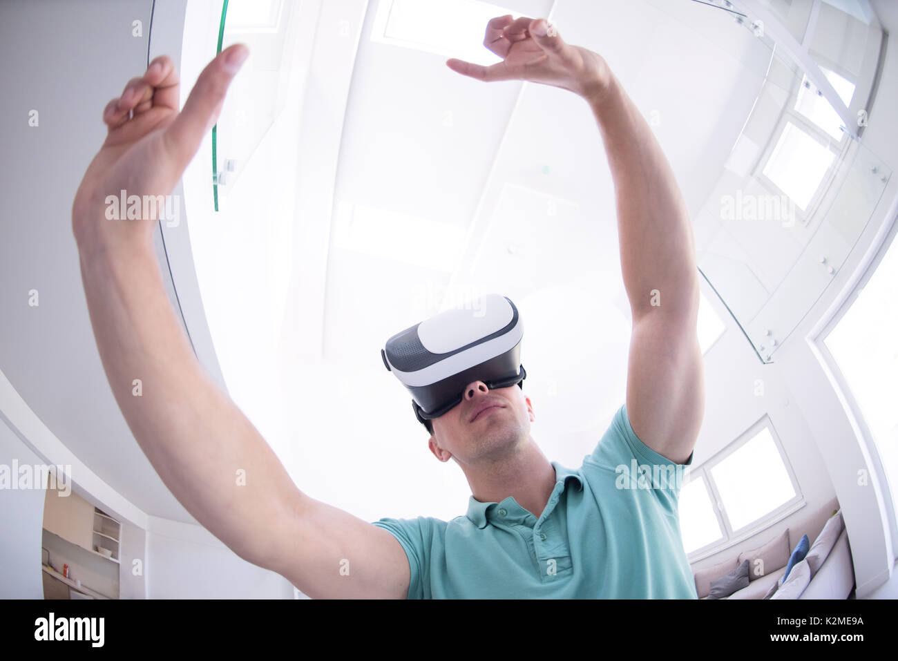 happy man getting experience using VR-headset glasses of virtual ...