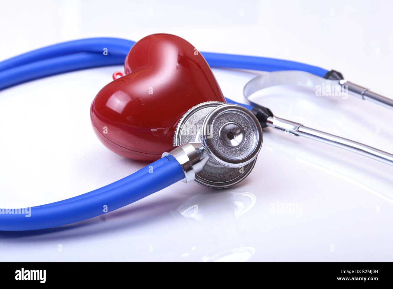 Red heart and a stethoscope isolated on white background Stock Photo ...