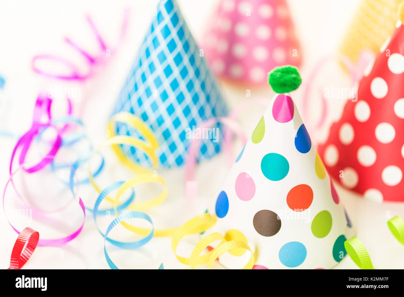 Colorful party hats for kids Birthday Party Stock Photo - Alamy