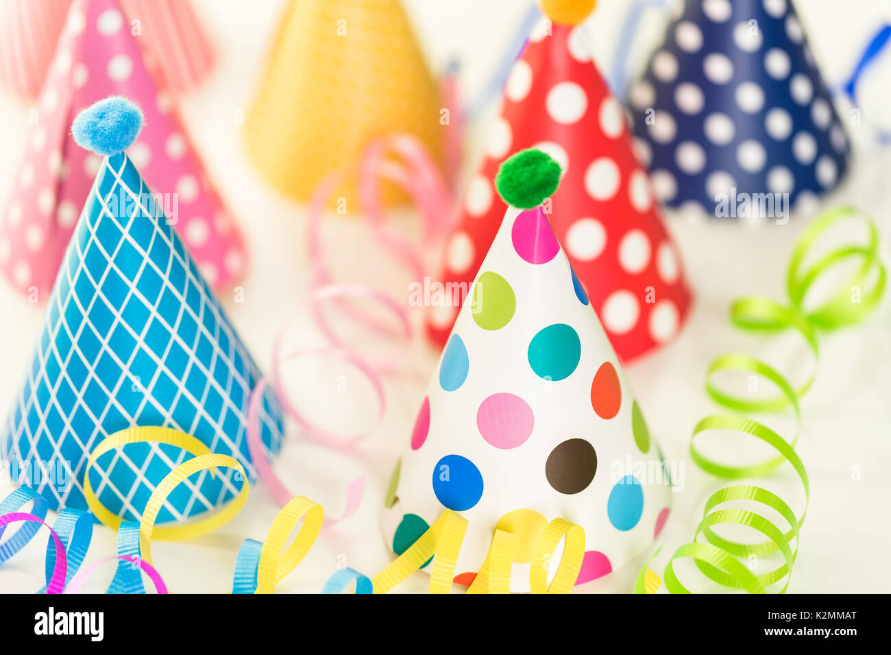 Colorful party hats for kids Birthday Party Stock Photo - Alamy